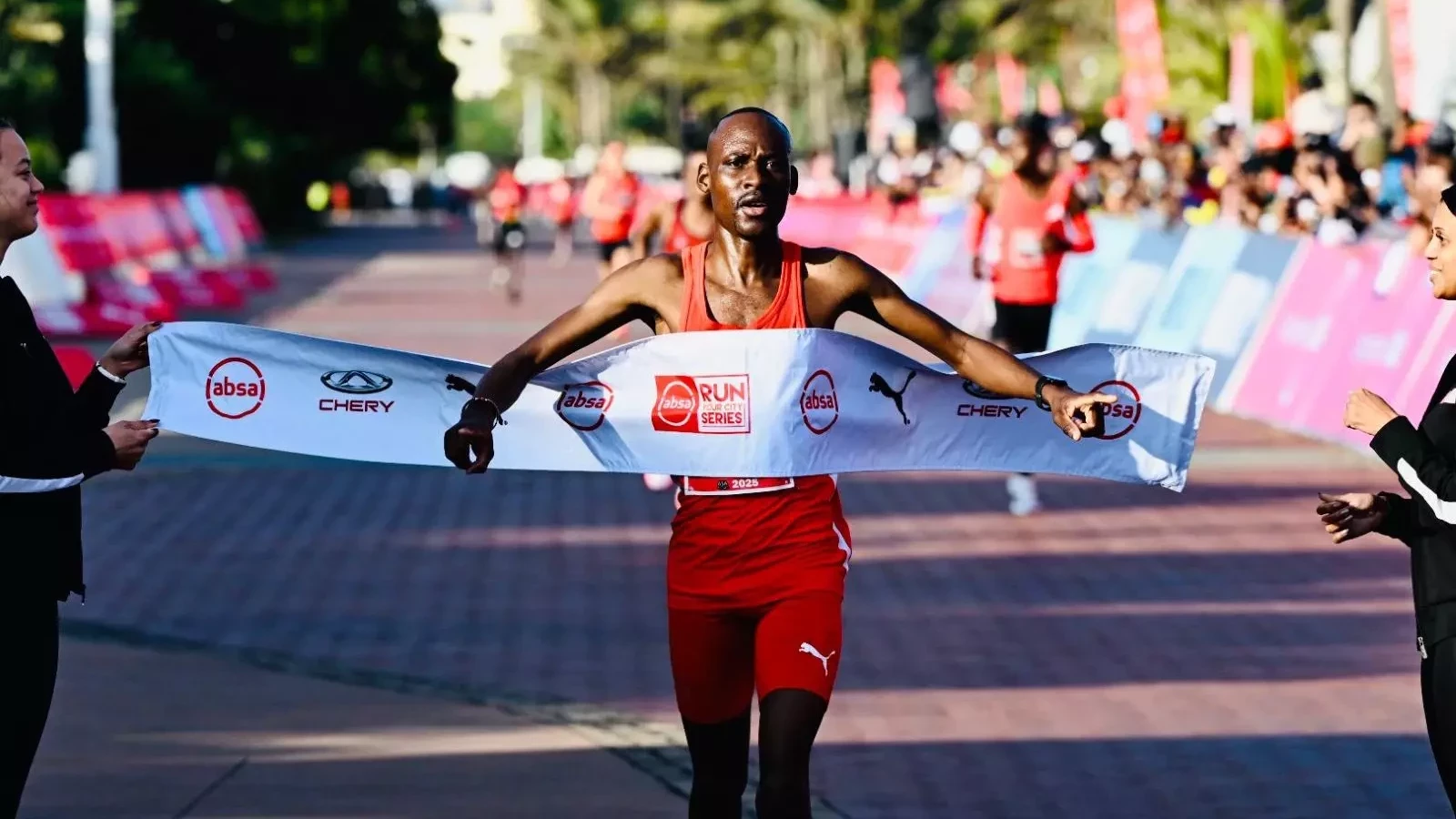 Kabelo Mulaudzi secures back-to-back victories at the Absa Run Your ...