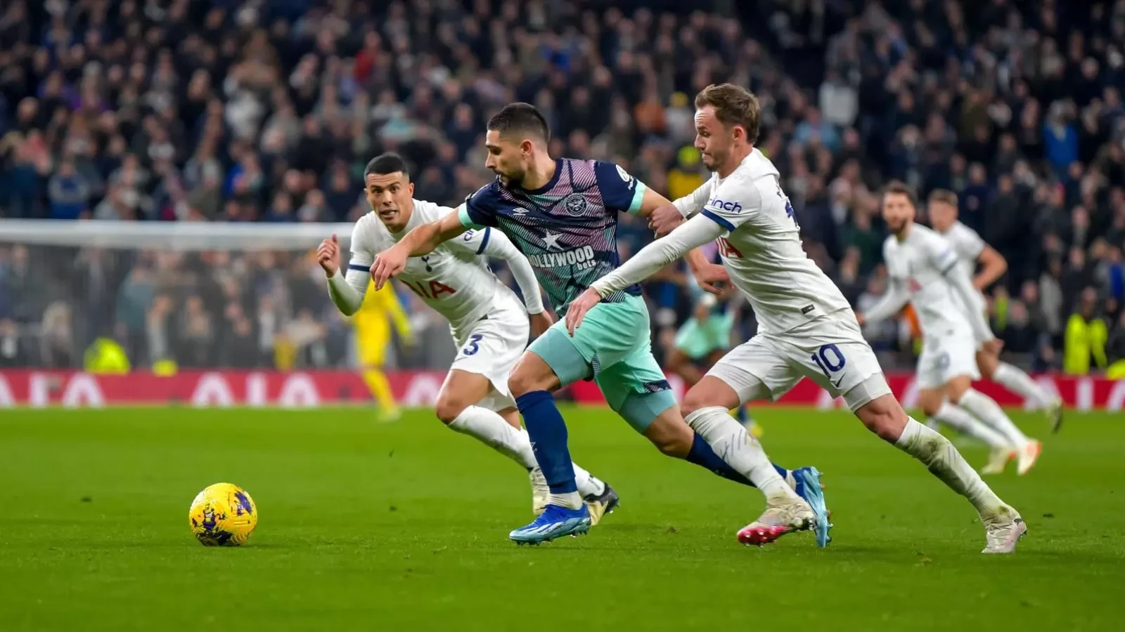 Tottenham's James Maddison and Neal Maupay clash over goal celebration ...