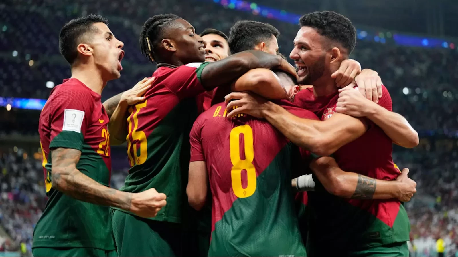 Fernandes double sends Portugal into knock-outs | football